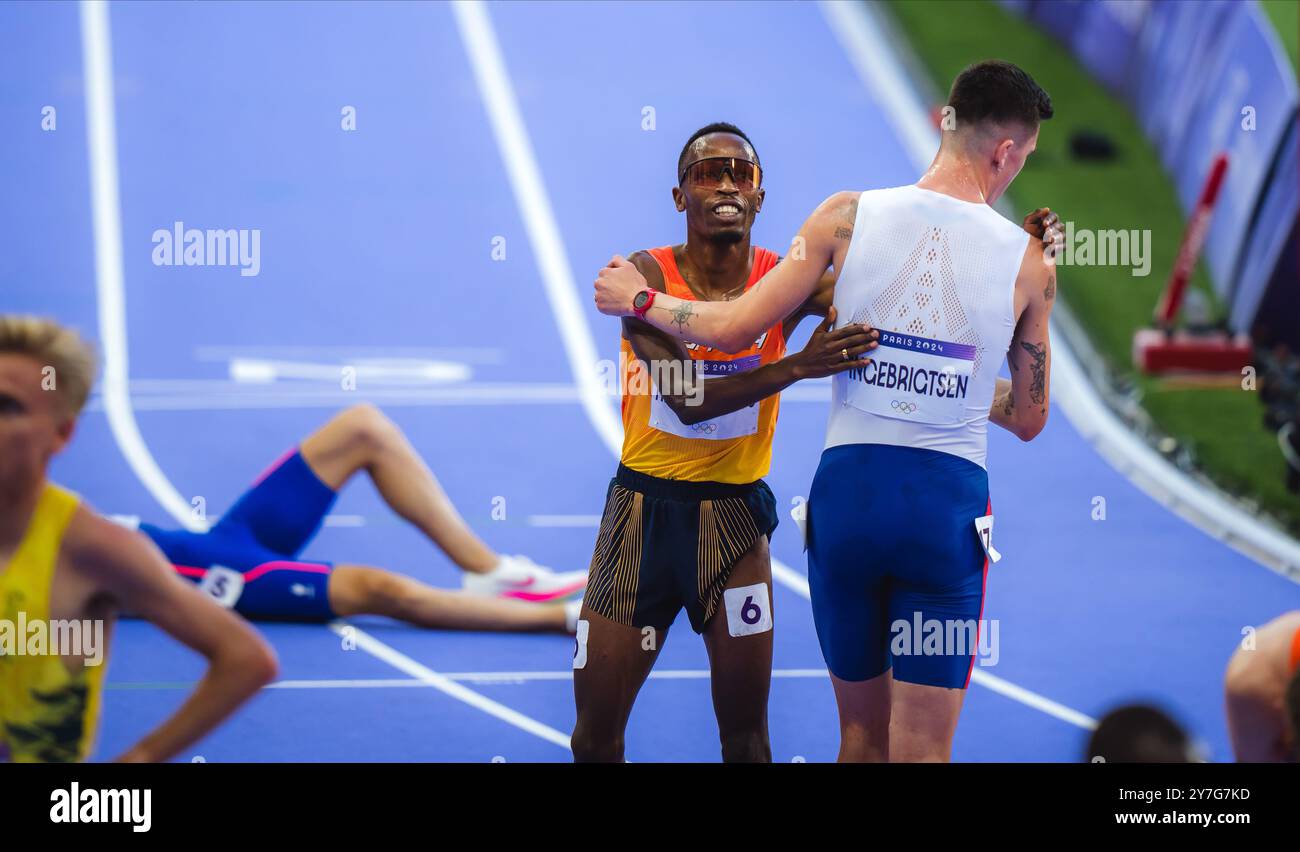 Gabriel Tual participating in the 5000 meters at the Paris 2024 Olympic ...