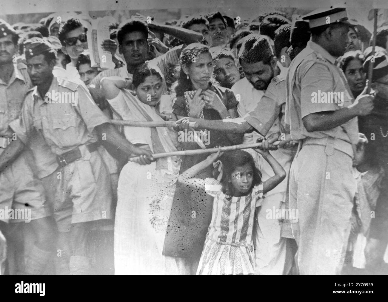 RELIGION - POLICE HOLD BACK CROWDS ON THE STREETS OF BOMBAY WHO ARE ...