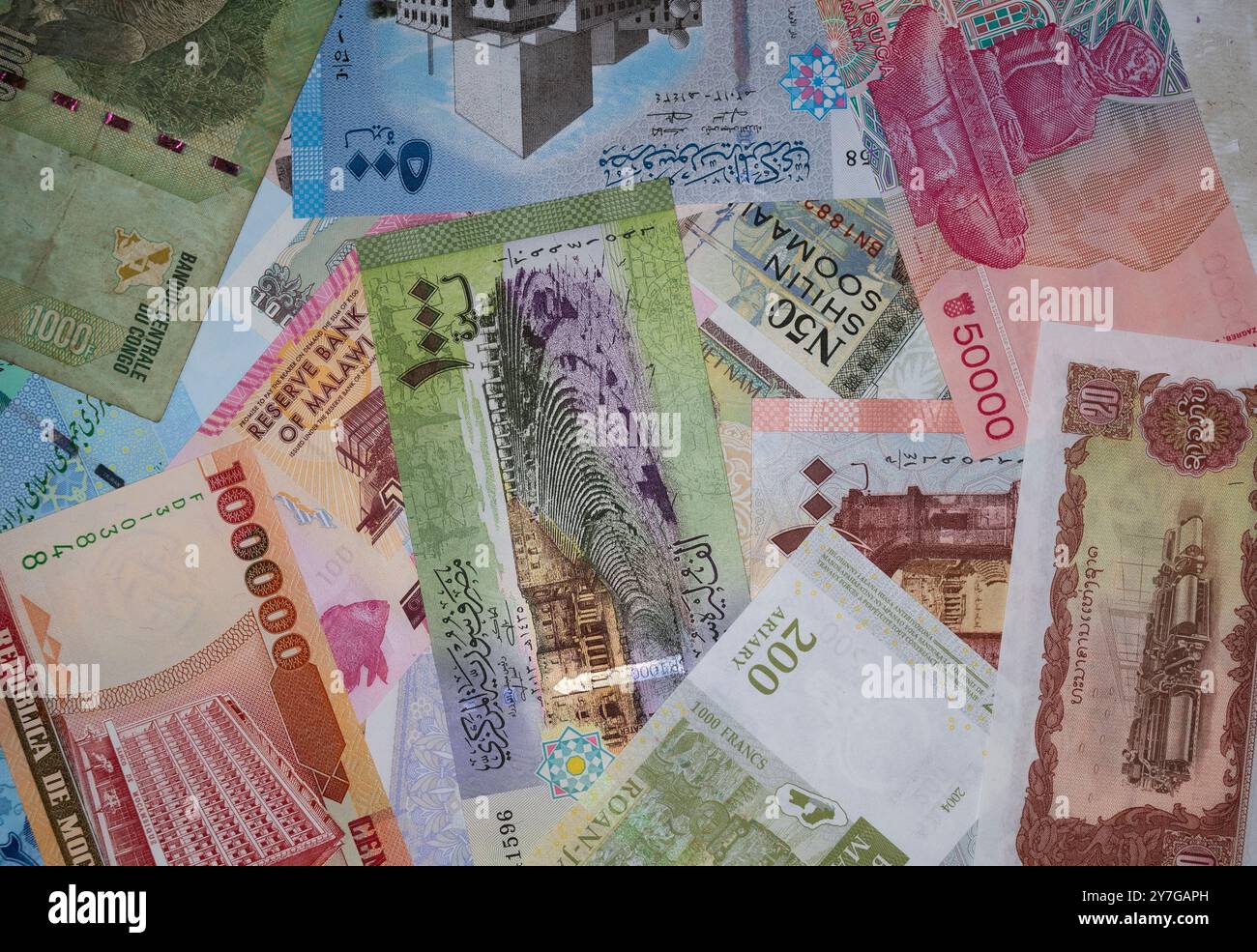 A collection of various international banknotes from different ...