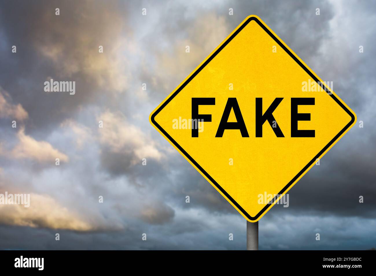 Fake Warning Sign Against Stormy Sky Stock Photo - Alamy