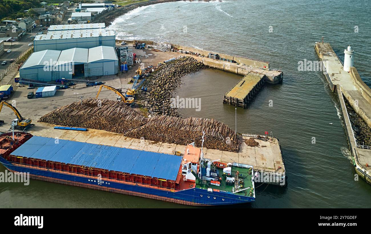 Buckie Harbour Moray Coast Scotland large boat and pile of logs for ...
