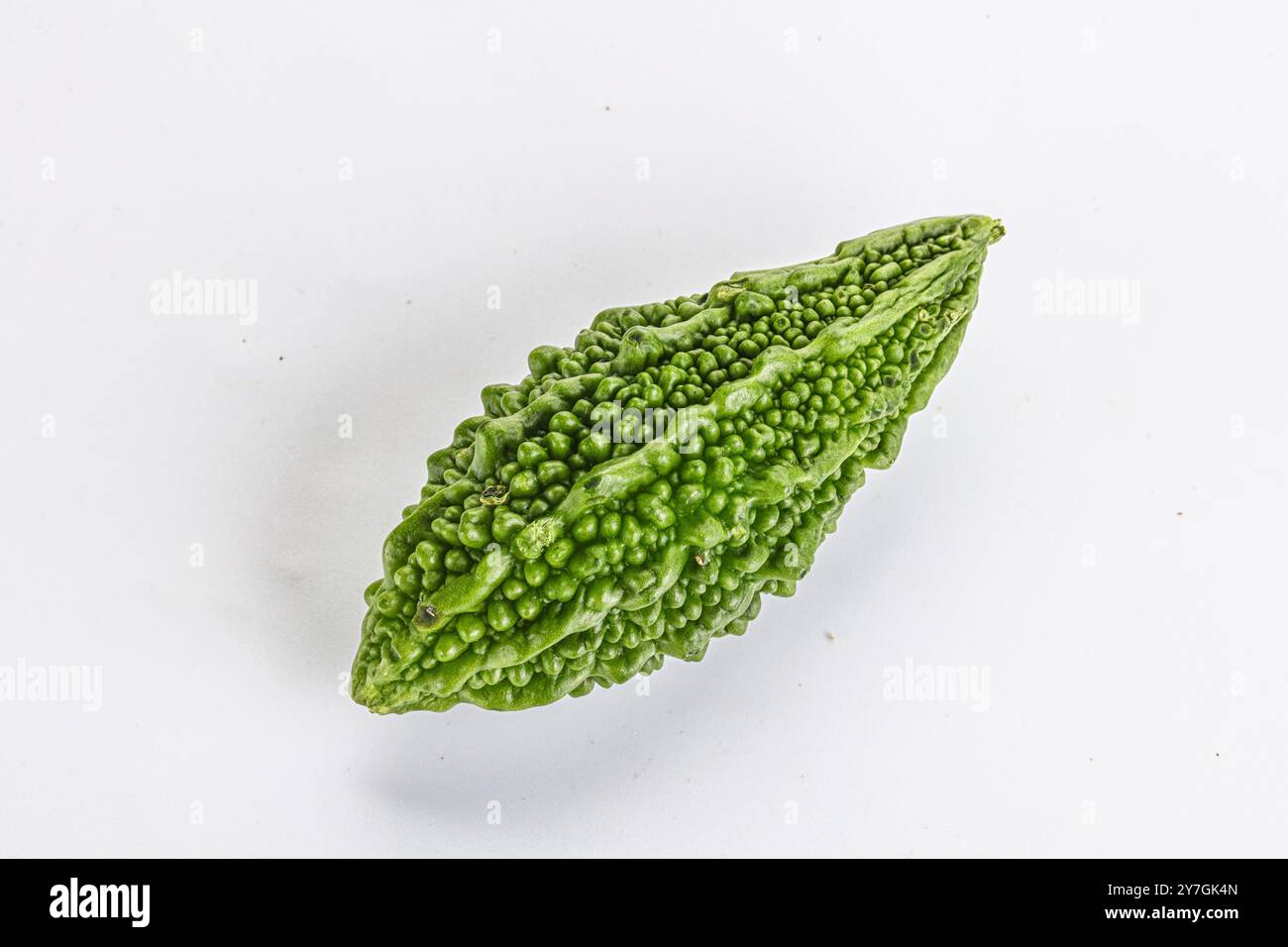 Green raw bitter lemon vegetables heap Stock Photo - Alamy