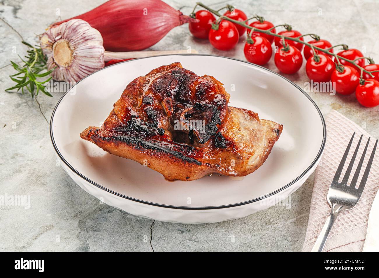 Roasted pork knuckle steak with bone Stock Photo - Alamy