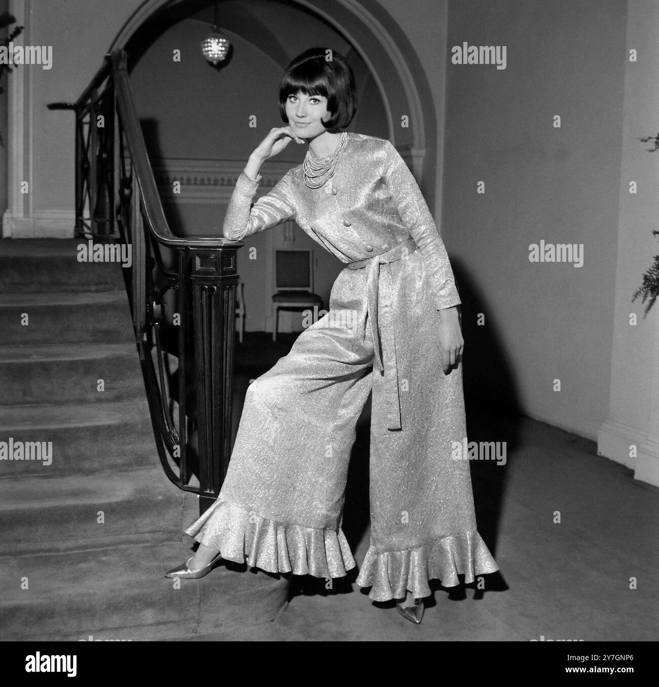 Black and gold outfit Black and White Stock Photos & Images - Alamy