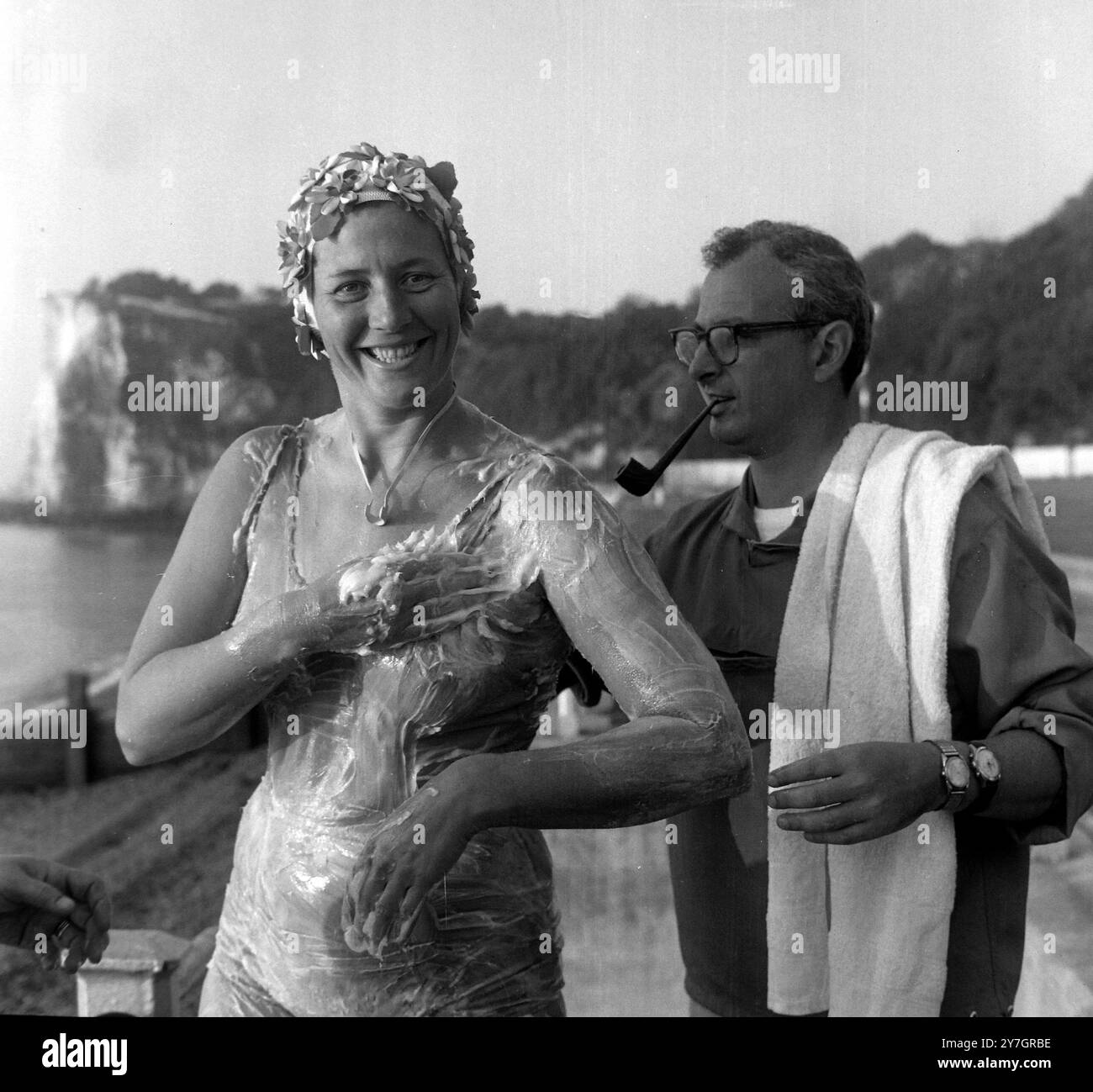 29 SEPTEMBER 1964 Greta Andersen pictured being greased by her manager ...