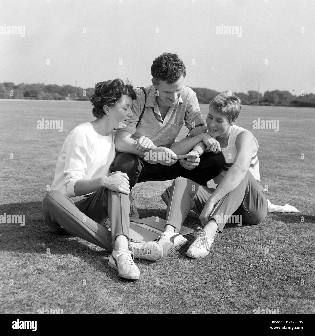 ATHLETICS PACKER ANNE AND COACH DENNIS WATTS AND MARY RAND IN ...