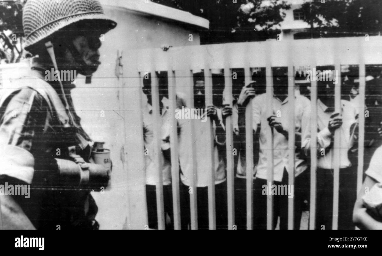 VIETNAM WAR ARMY TROOPER STANDS GUARD IN SAIGON ; 21 SEPTEMBER 1964 ...