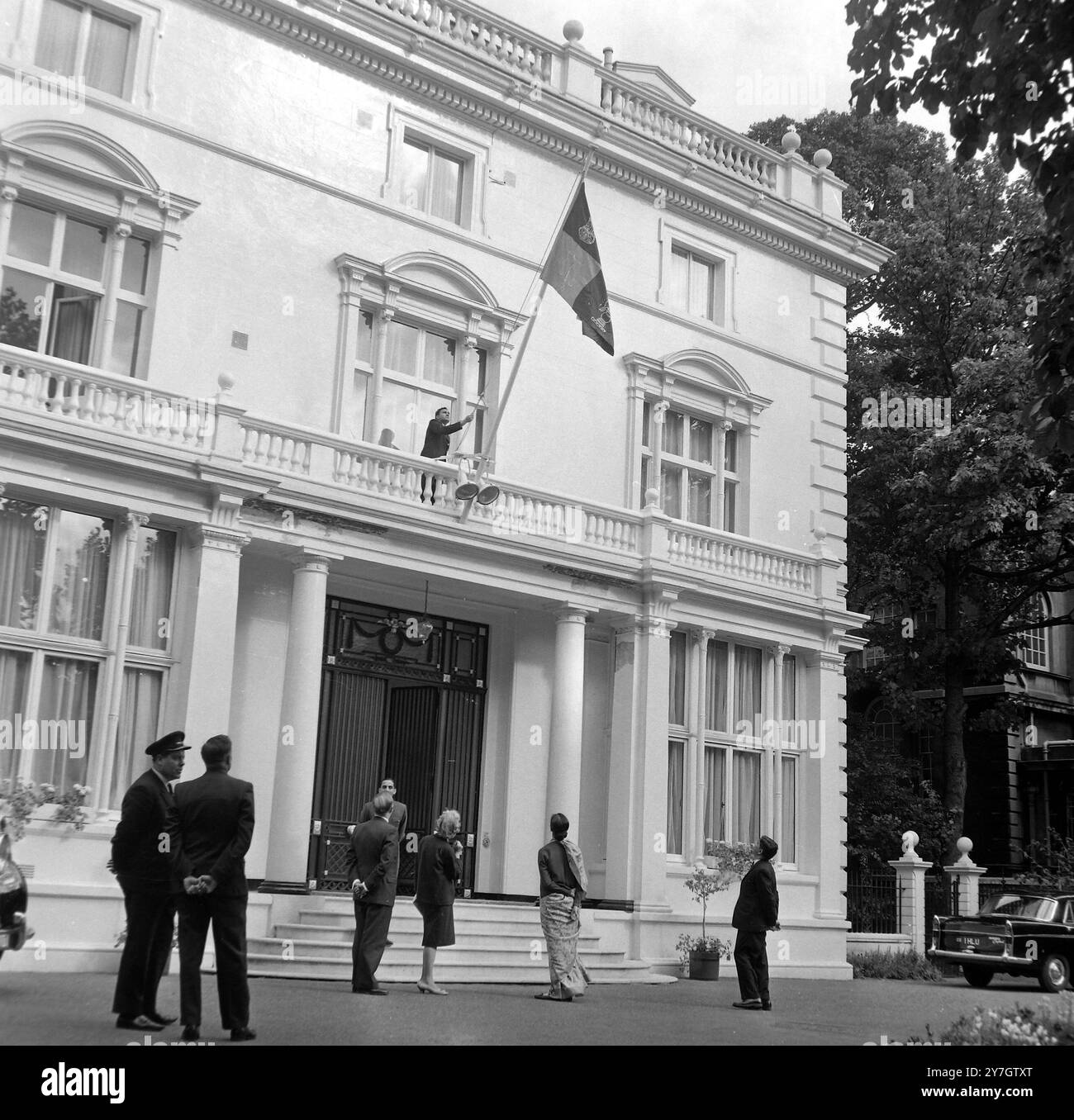Flags hoisted national flag Black and White Stock Photos & Images - Alamy
