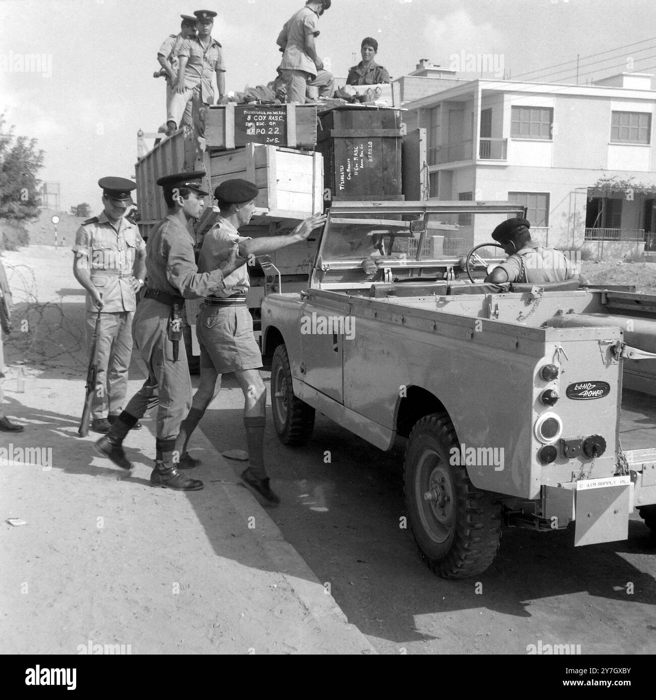 BRITISH ARMY MEMBER RAISES HIS ARMS TO BE SEARCHED IN NICOSIA, CYPRUS ...