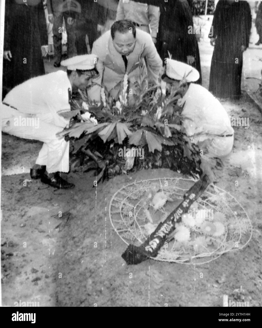 MAJOR GENERAL KHANH NGUYEN LAYING WREATH ON GRAVE IN SAIGON / ; 5 ...