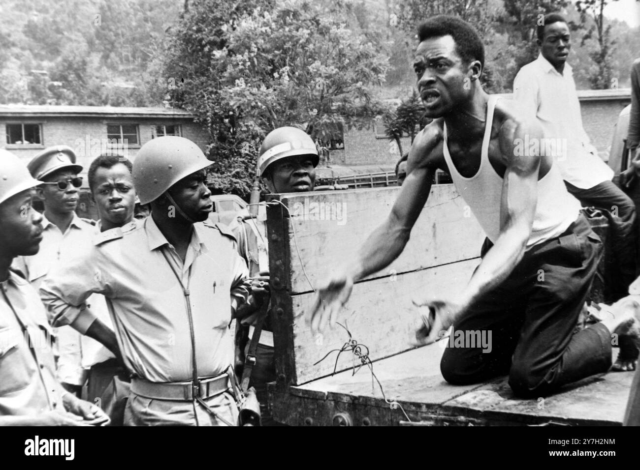 PRISONER WITH OFFICER IN BUKAVU, CONGO BACK OF A TRUCK ; 28 AUGUST 1964 ...