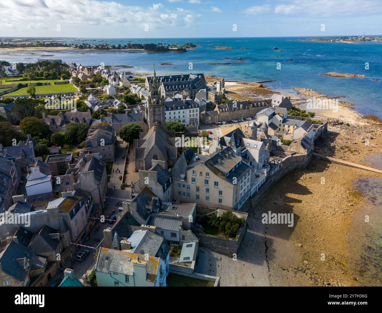 Aerial view of a coastal town with historic buildings and a scenic ...