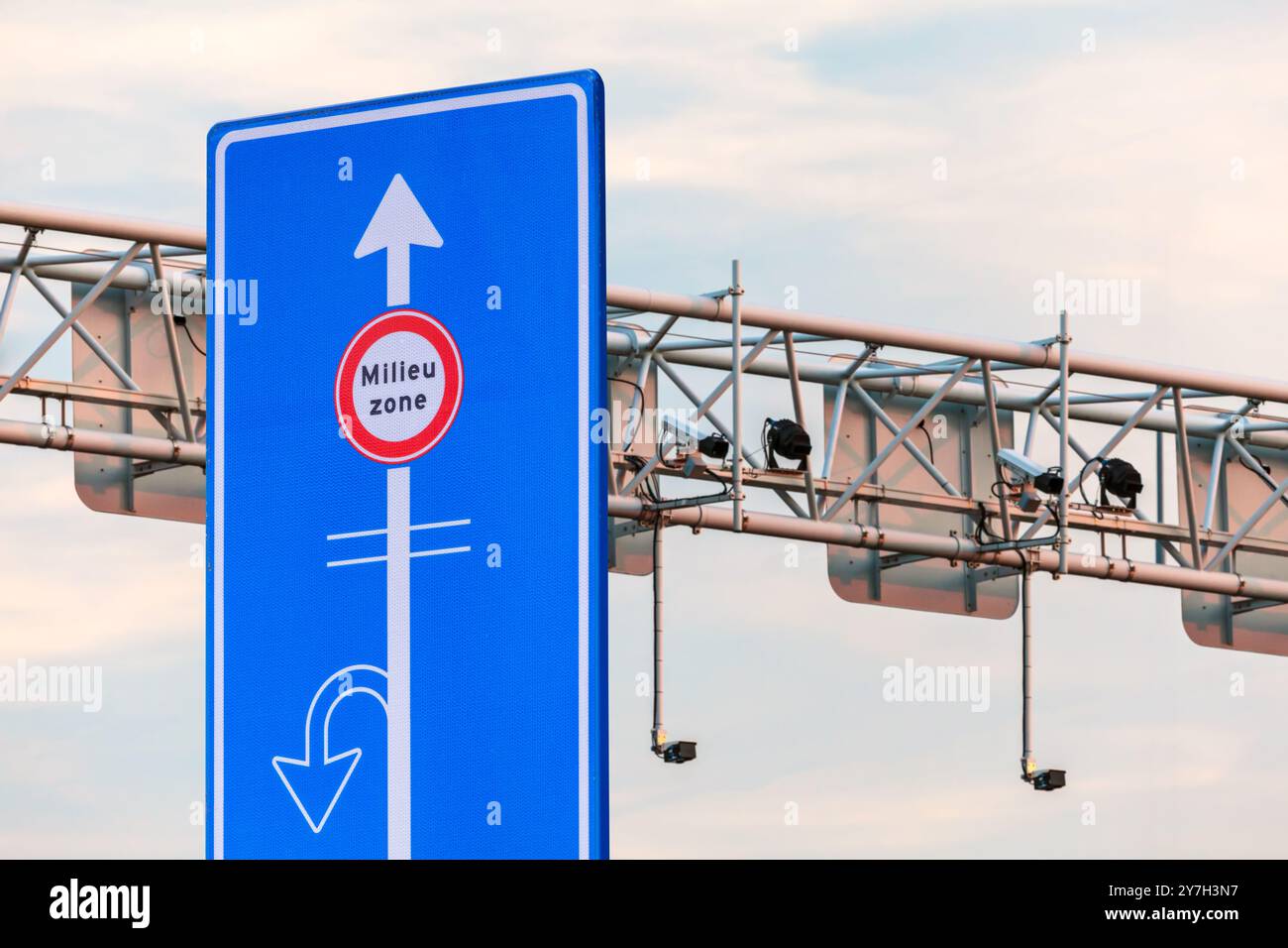 City warning sign with the Dutch text for "Emission Zone" in front of ...