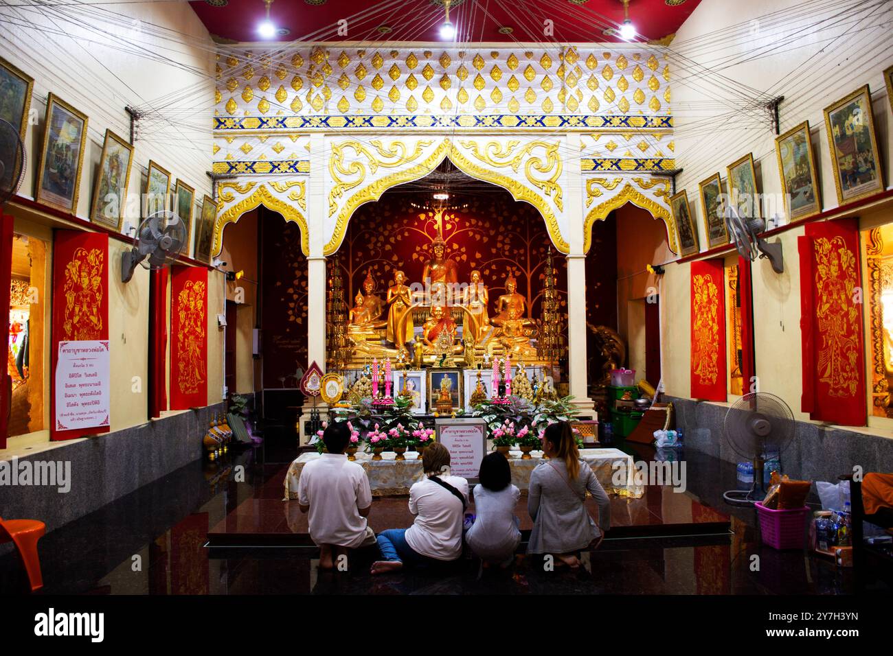Ancient buddha in antique ubosot of Wat Mai Supradit Tharam temple for thai people travelers ...