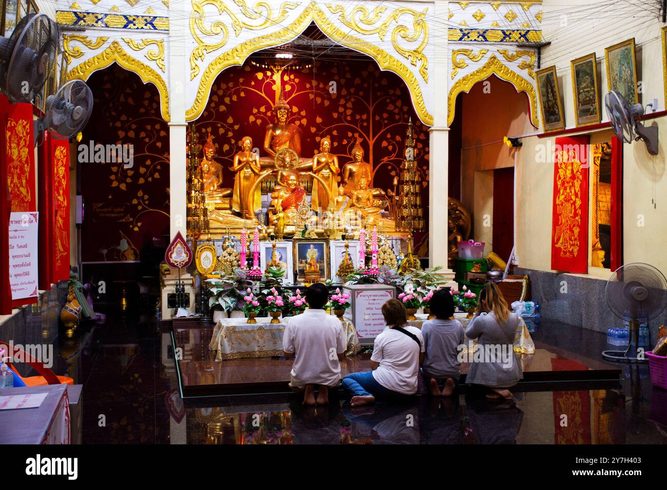 Ancient buddha in antique ubosot of Wat Mai Supradit Tharam temple for thai people travelers ...