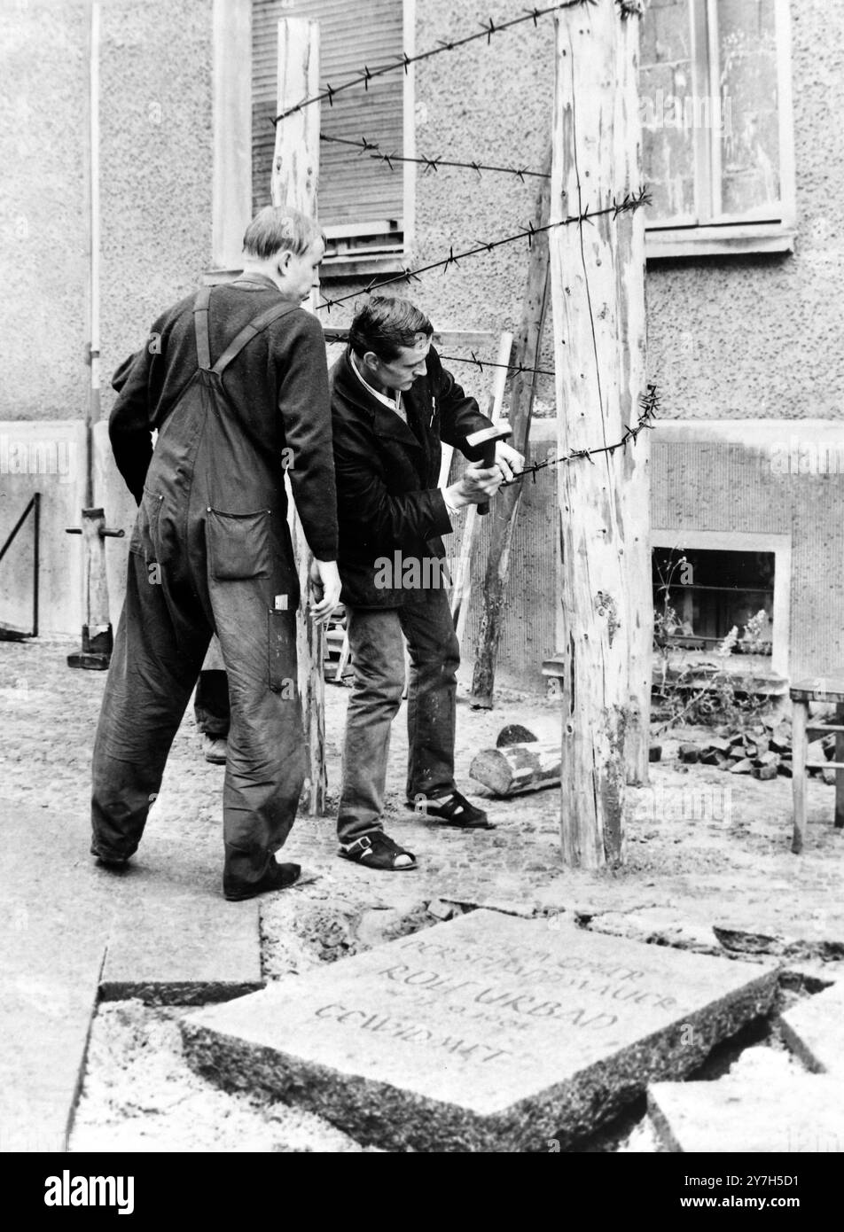 BORDER MEMORIAL STONE IS SET INTO PAVEMENT IN EAST BERLIN ; 13 AUGUST ...