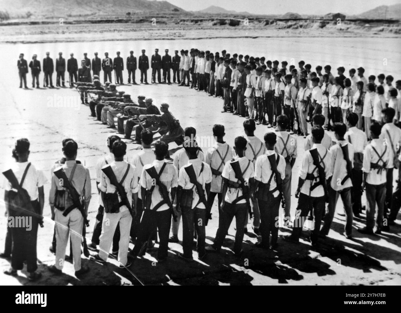 ARMY COMMUNIST BOYS AND GIRLS WATCH EXERCISES BY SOLDIERS IN COMMUNIST ...