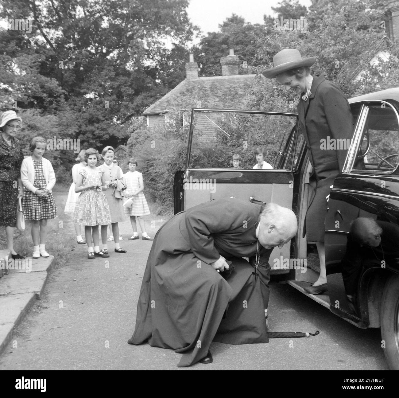 ARCHBISHOP OF CANTERBURY MICHAEL RAMSEY - WIFE DROPS UMBRELLA IN ...