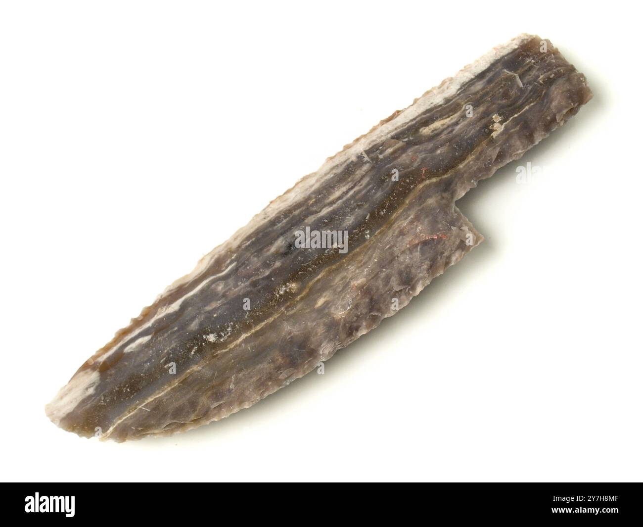 Flintstone Knife Blade isolated on white Background Stock Photo - Alamy