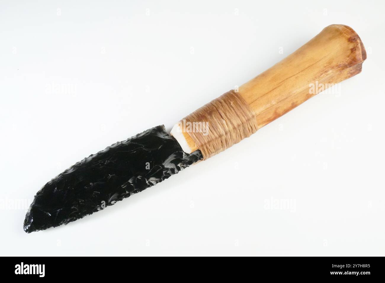 Stone Age Knife with Bone Handle and Obsidian Blade isolated on white ...