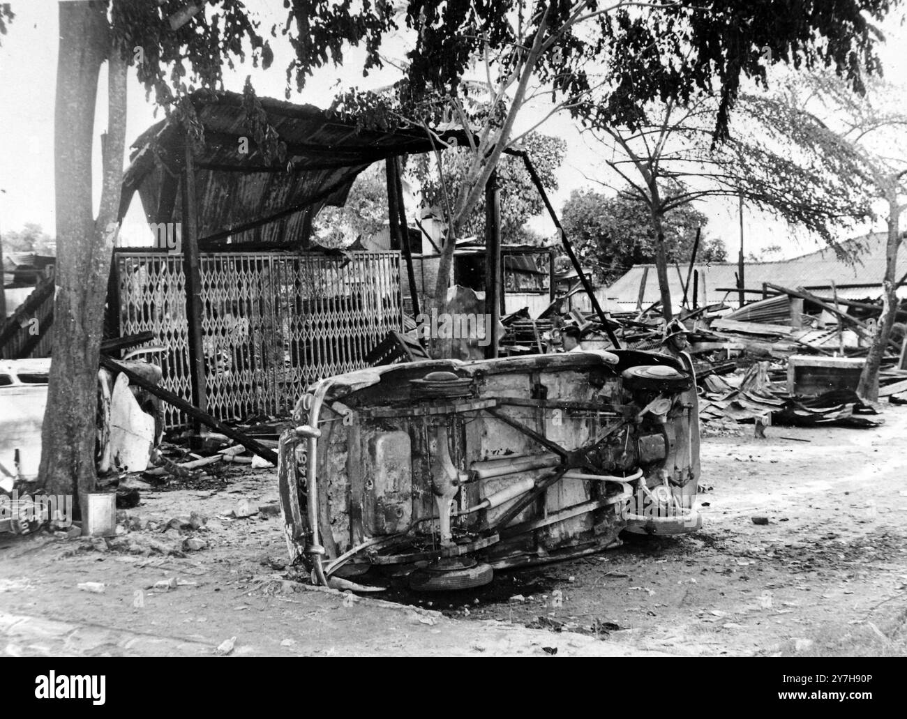 RIOTS CAR OVERTURNED IN SINGAPORE ; 22 JULY 1964 Stock Photo - Alamy