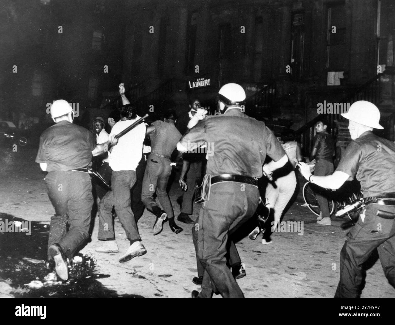 PEOPLE INJURED IN RIOTS IN HARLEM IN NEW YORK, POLICE DISPERSE CROWDS ...