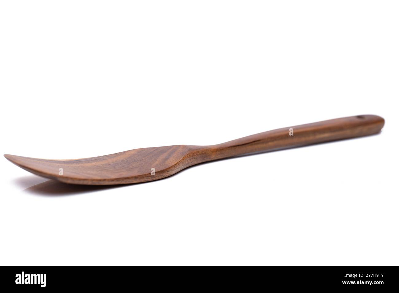 wooden kitchen spatulas on white background Stock Photo - Alamy