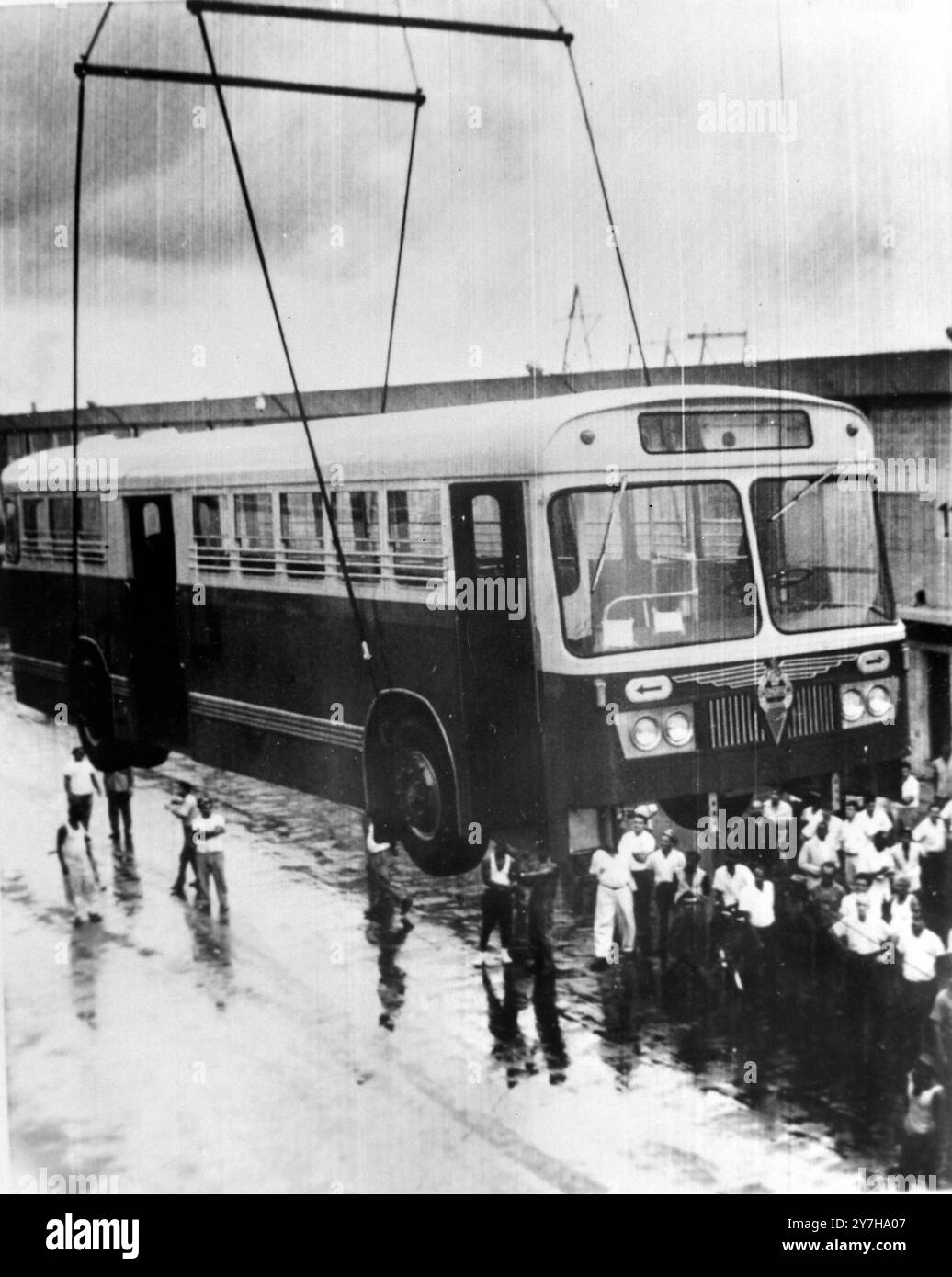 As cheering dock workers in Havana, Cuba look on as the first in a ...