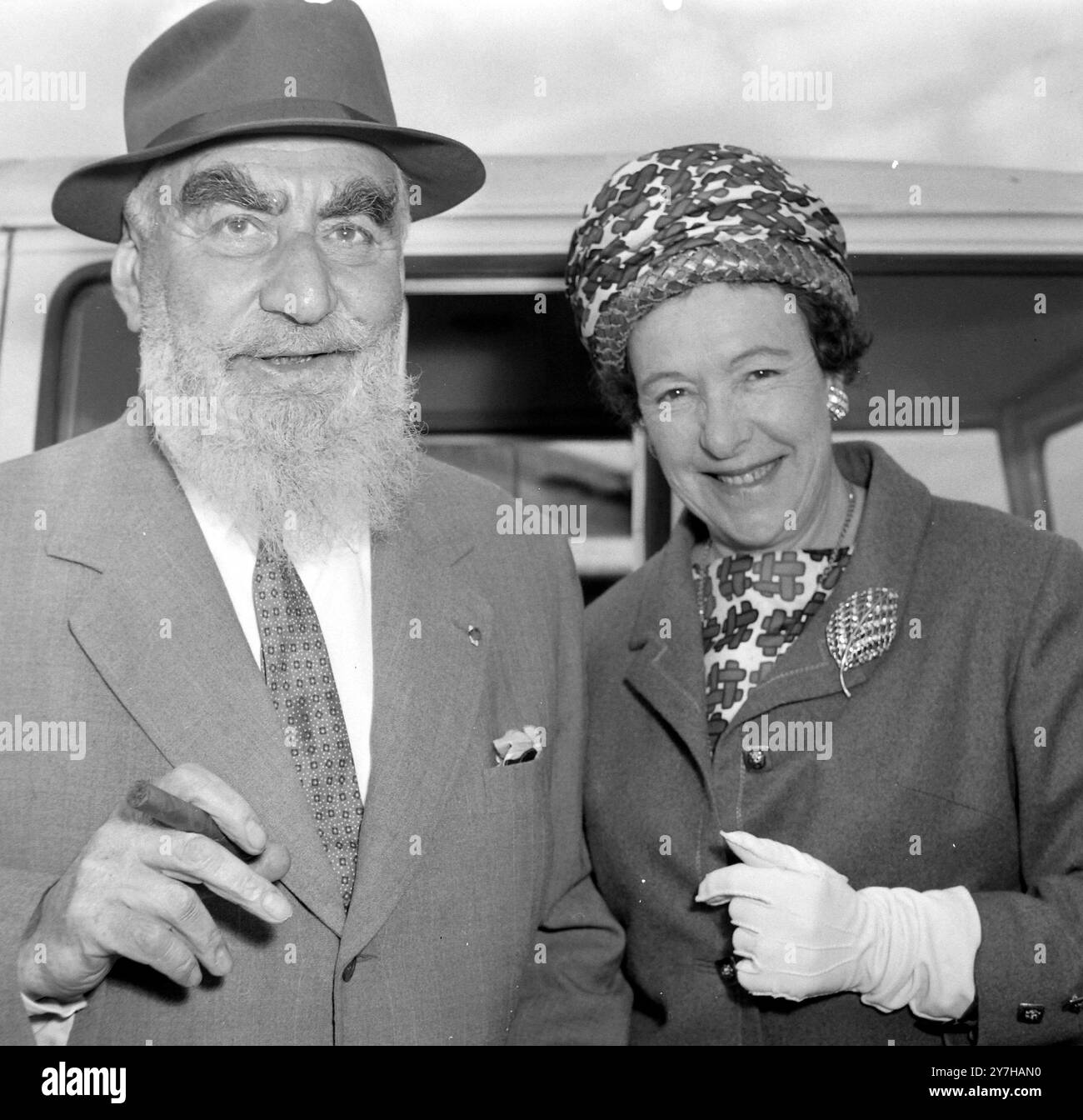NUBAR GULBENKIAN WITH WIFE MARIE AT LONDON AIRPORT / ; 13 JULY 1964 ...