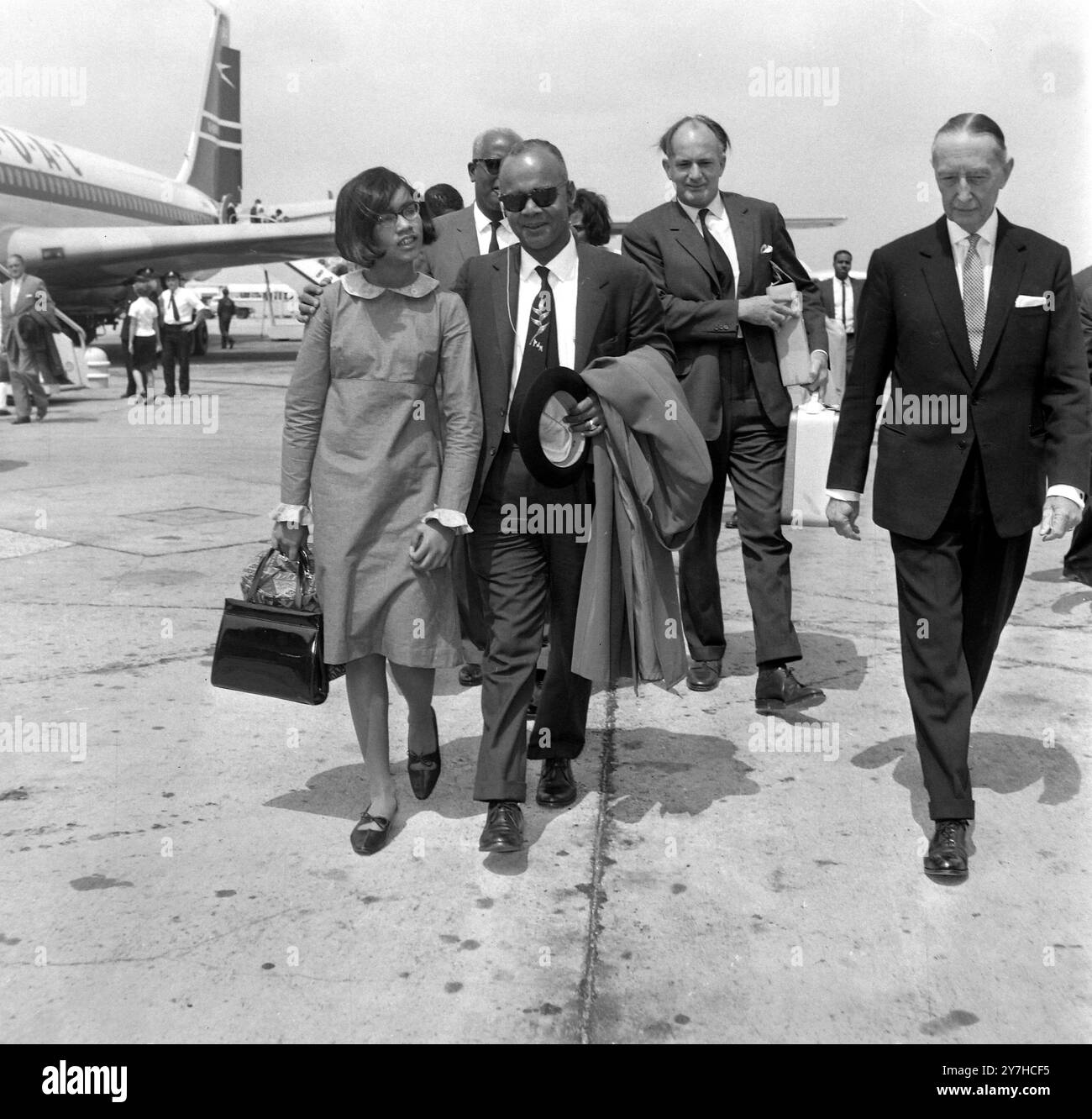 ERIC WILLIAMS AT LONDON AIRPORT WITH DAUGHTER ERICA / ; 5 JULY 1964 ...