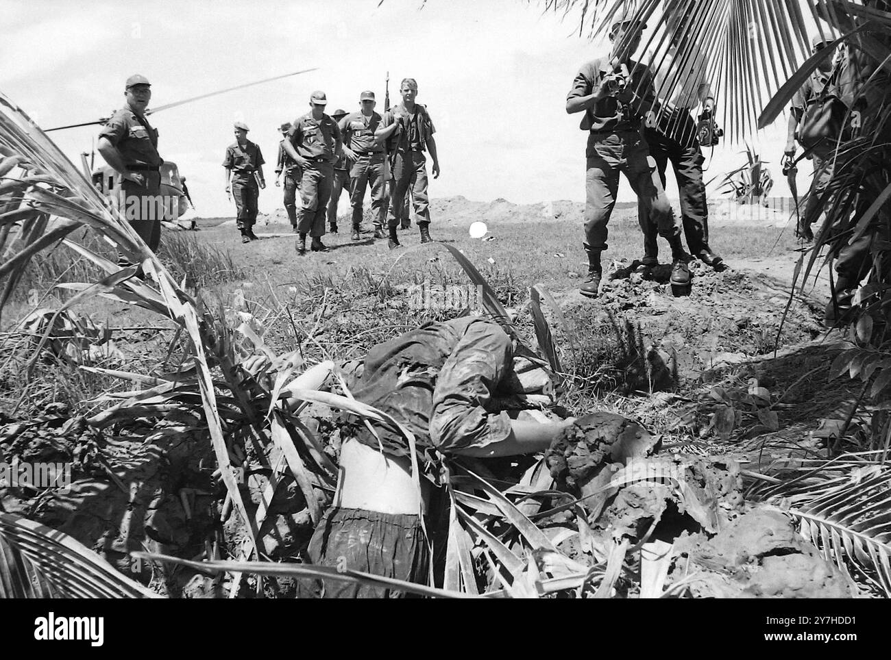 COMMUNIST VIET CONG GUERRILLAS UNDER GUARD IN LONG TOAN IN VIETNAM ; 1 ...
