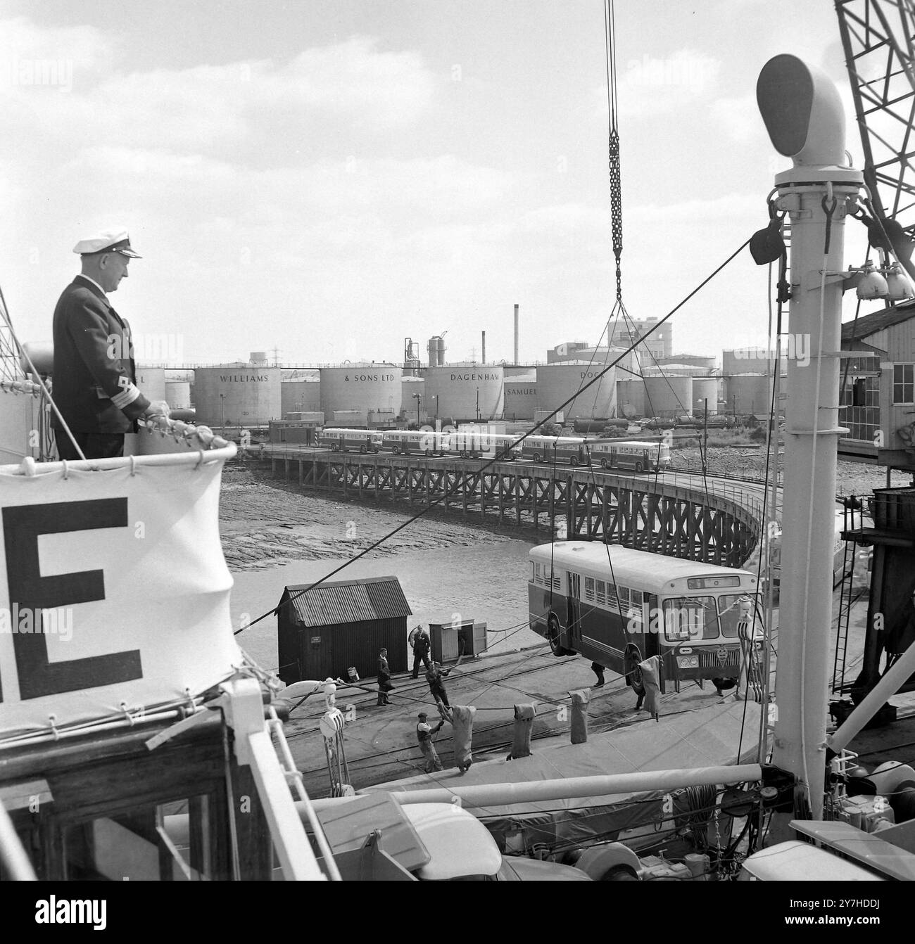 Captain Helmut Queisser (on bridge left) of East German ship Heinrich ...