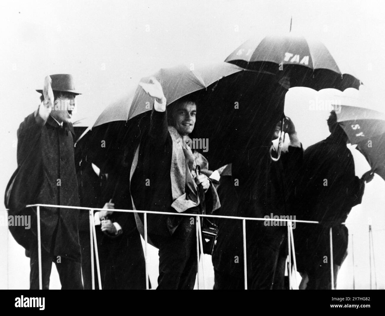 The beatles with umbrellas hi-res stock photography and images - Alamy