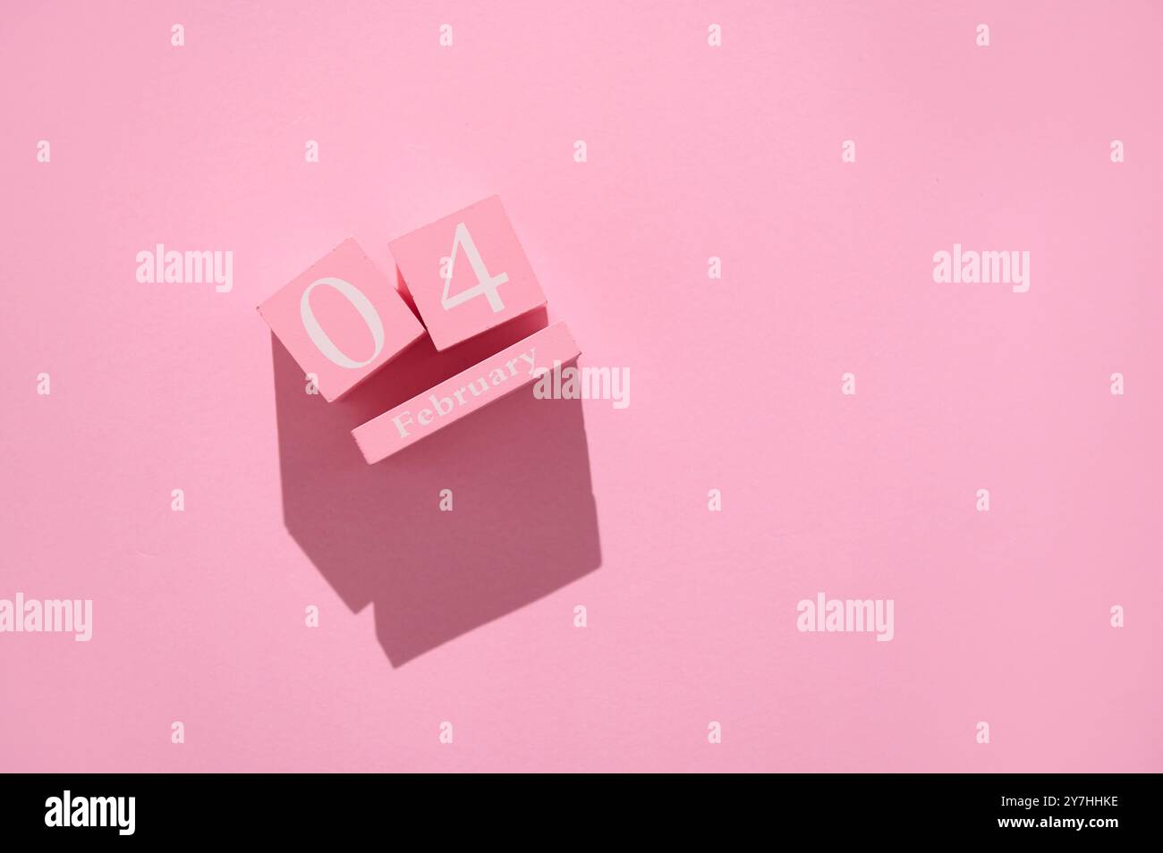 Wooden calendar blocks showcasing the date February 4th. Set against a ...