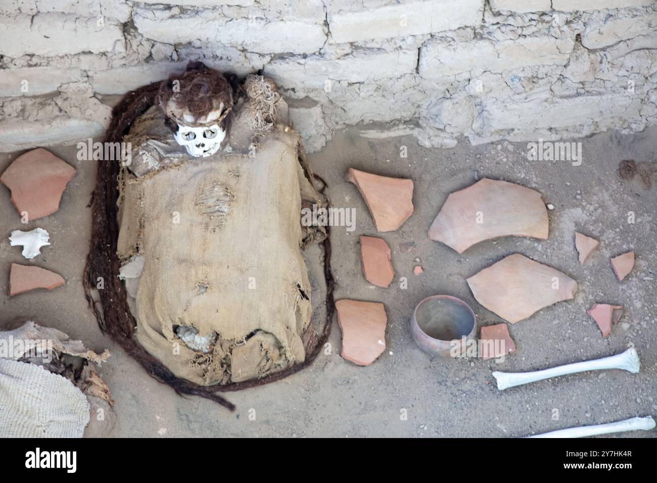 Bones in open inca cemetery in Nazca region , Peru Stock Photo - Alamy