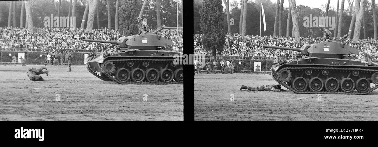 ARMY TANK WITH SOLDIER LYING UNDER IT IN ROME ; 27 MAY 1964 Stock Photo ...