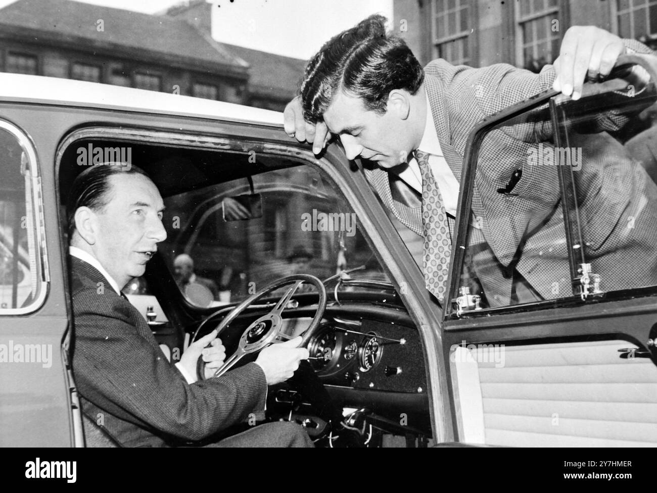 DRIVERS PETER MELDRUM AND LOGAN MORRISON IN MINI-COOPER BEFORE THE ...