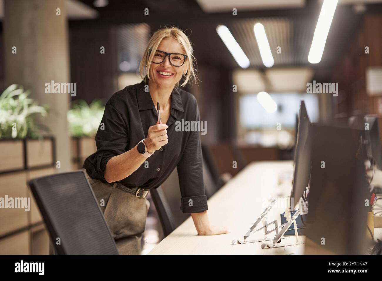 Confident and accomplished Businesswoman engaging in a Modern ...