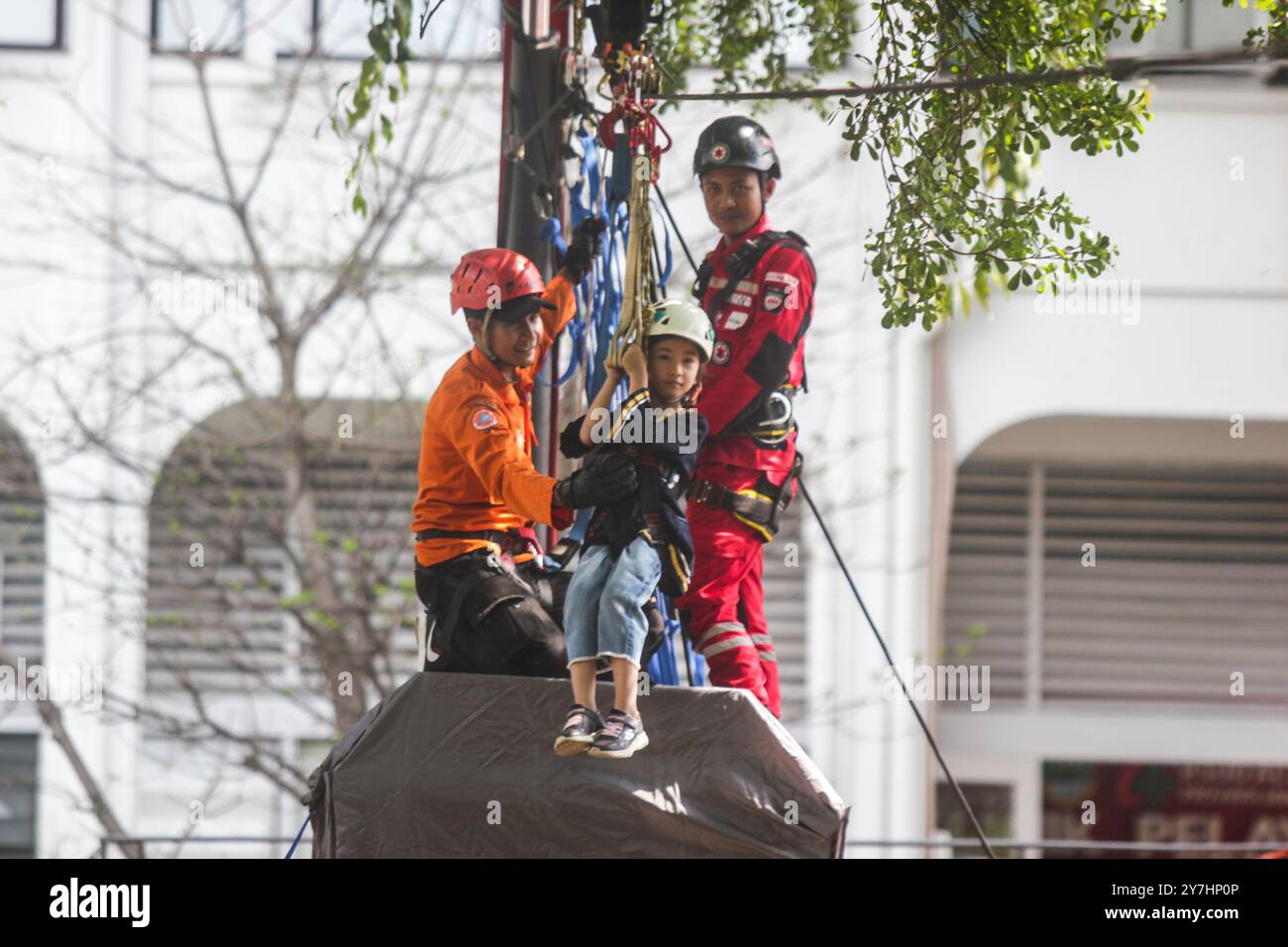 Bandung, West Java, Indonesia. 29th Sep, 2024. A child plays flying fox ...