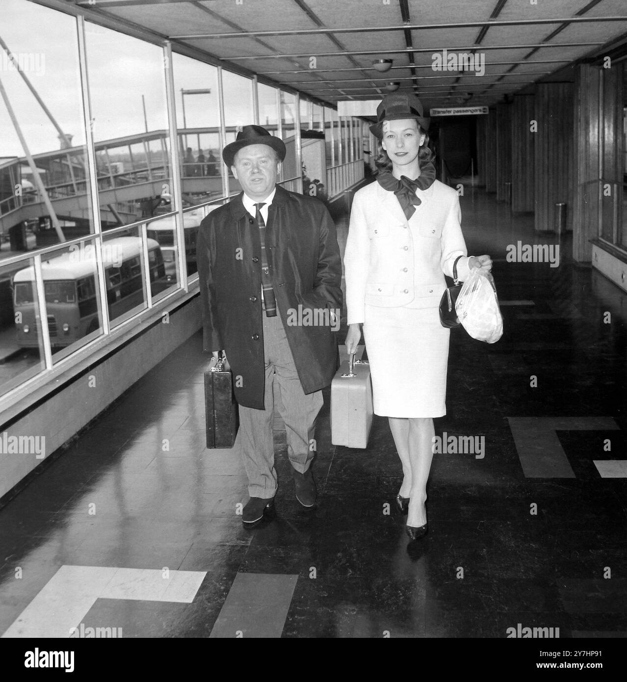 CHARLIE DRAKE WITH WIFE AT LONDON AIRPORT ; 7 MAY 1964 Stock Photo - Alamy