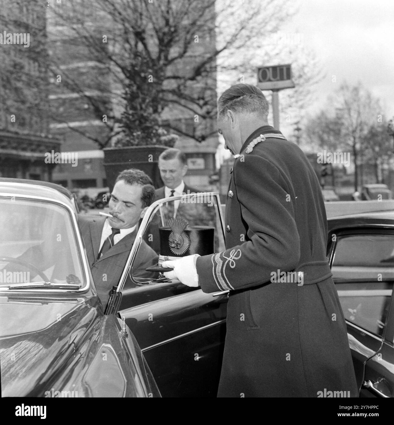 KING HUSSEIN OF JORDAN SMOKES CIGARETTE IN A BENTLEY IN LONDON ; 4 MAY ...