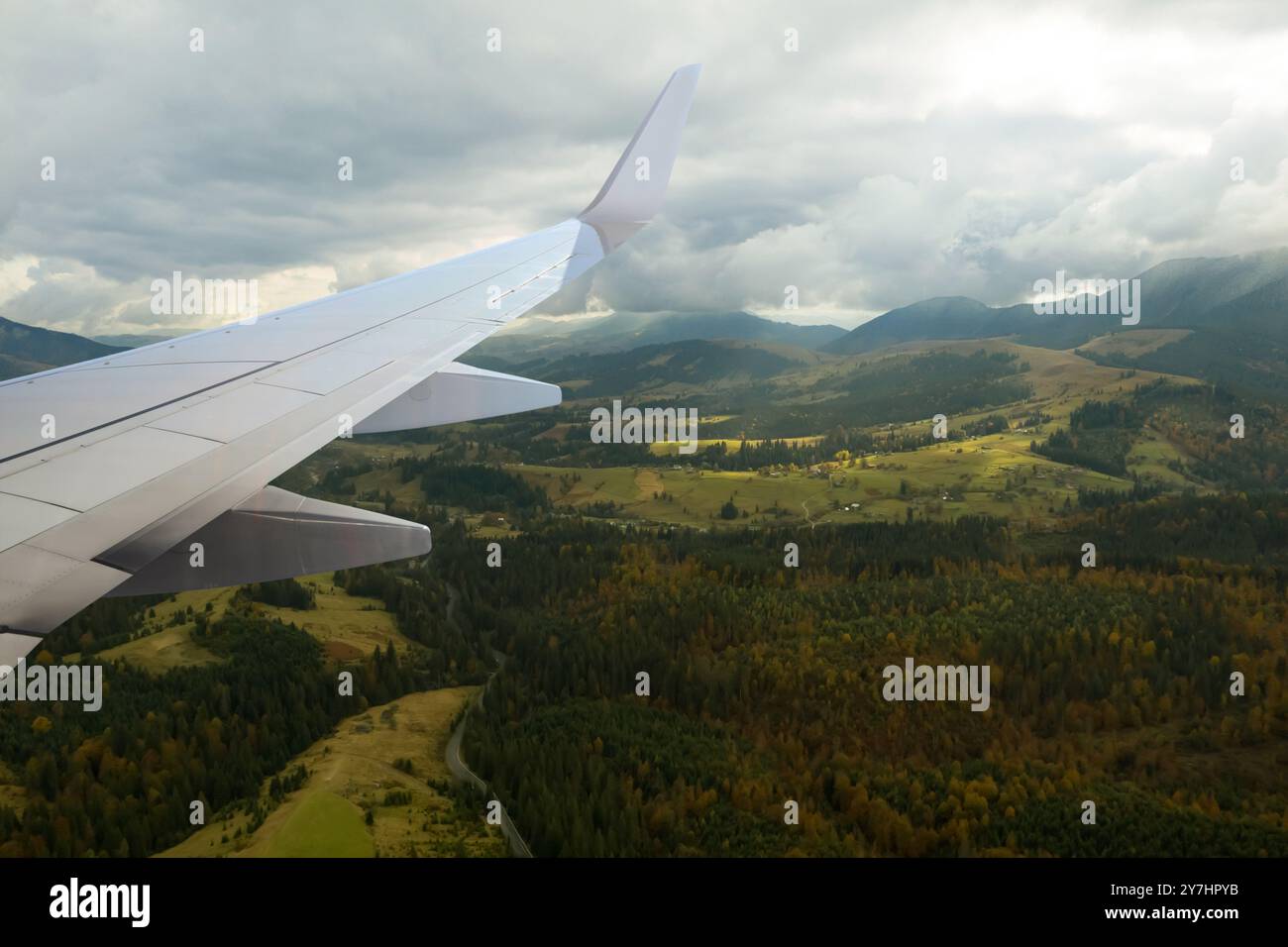 Aeroplane flying over mountain peak hi-res stock photography and images ...