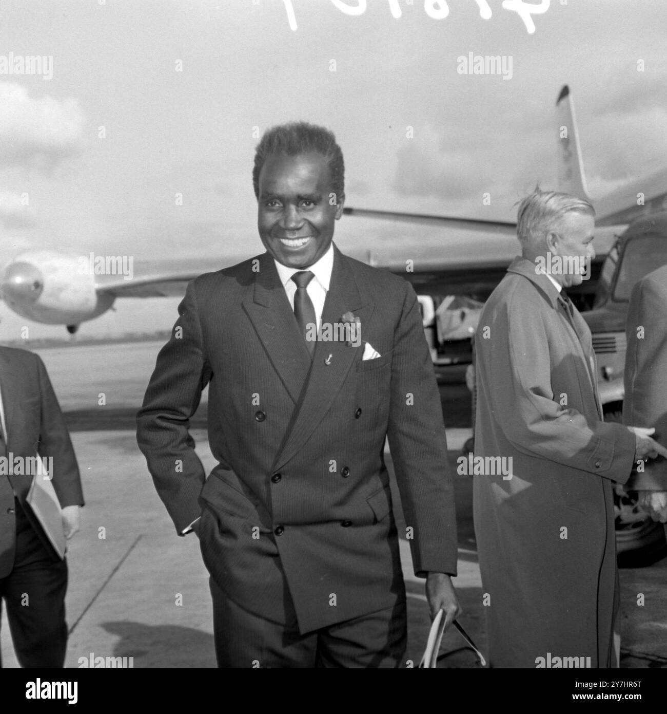 PREMIER OF NORTHERN RHODESIA KENNETH KAUNDA AT LONDON AIRPORT / ; 1 MAY ...
