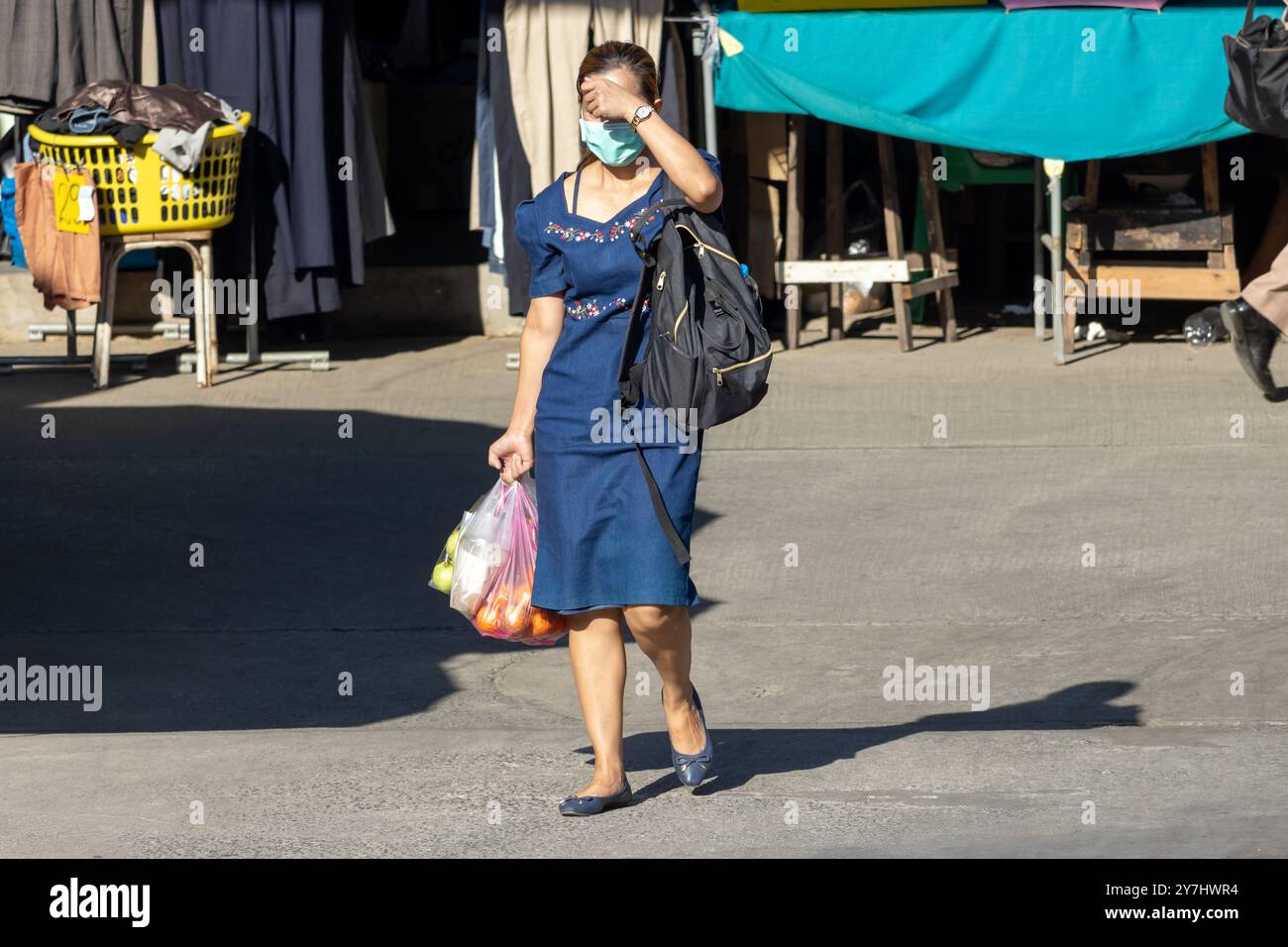 Hiding from the sun thai hi-res stock photography and images - Alamy