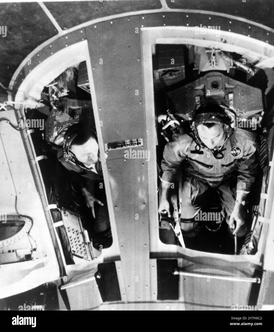 ASTRONAUTS FRANK BORMAN AND ALAN SHEPARD IN GEMINI SIMULATOR IN CAPE ...