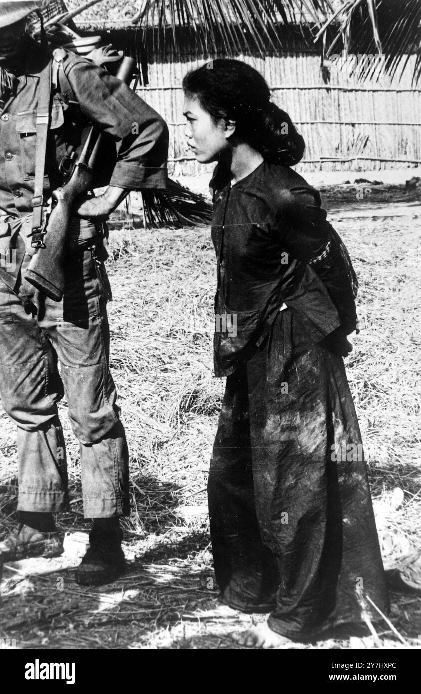 VIETNAM WAR VIET CONG WOMAN CAPTURED ; 6 APRIL 1964 Stock Photo - Alamy