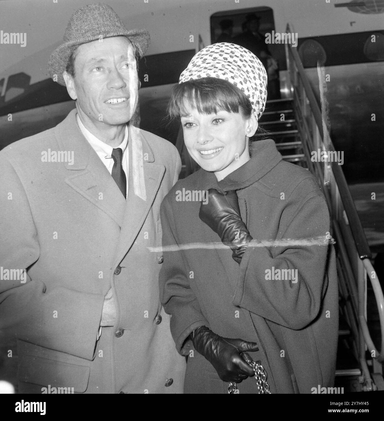 AUDREY HEPBURN WITH HUSBAND MEL FERRER AT LONDON AIRPORT / ; 3 APRIL ...