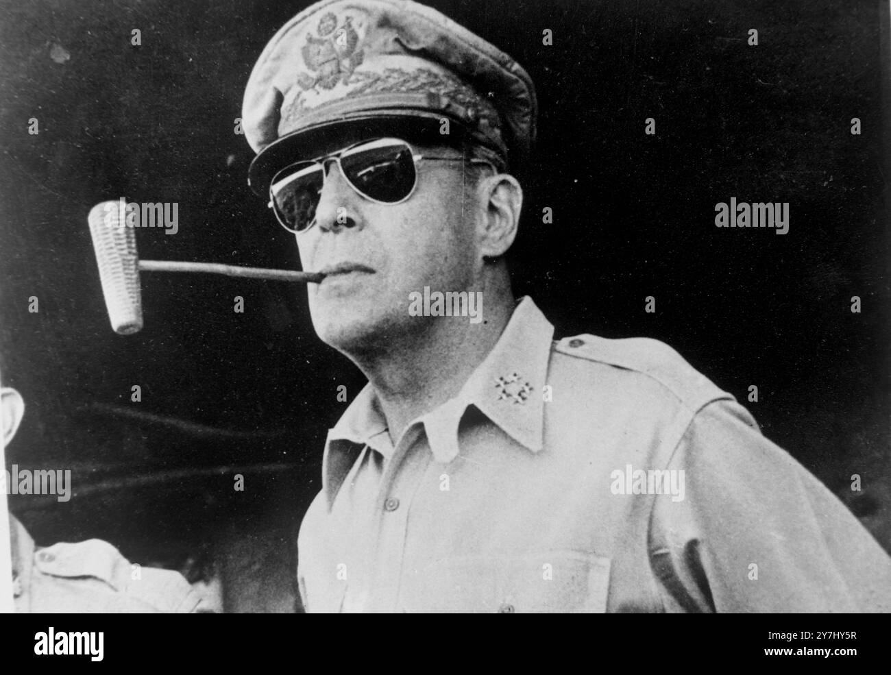 GENERAL DOUGLAS MACARTHUR AT WORLD WAR II PICTURED WITH A PIPE IN WASHINGTON / ; 1 APRIL 1964 ...