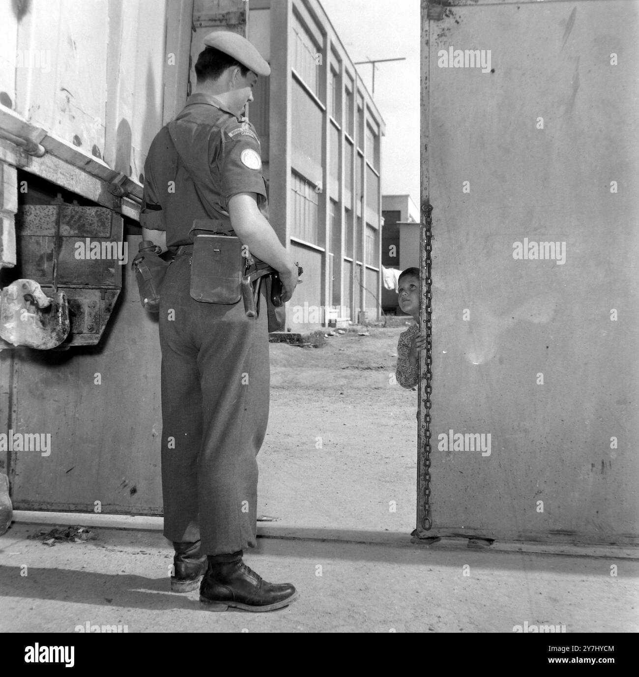ARMY CANADIAN SOLDIER KEEPS WATCH IN NICOSIA, CYPRUS WITH TURKISH BOY ...