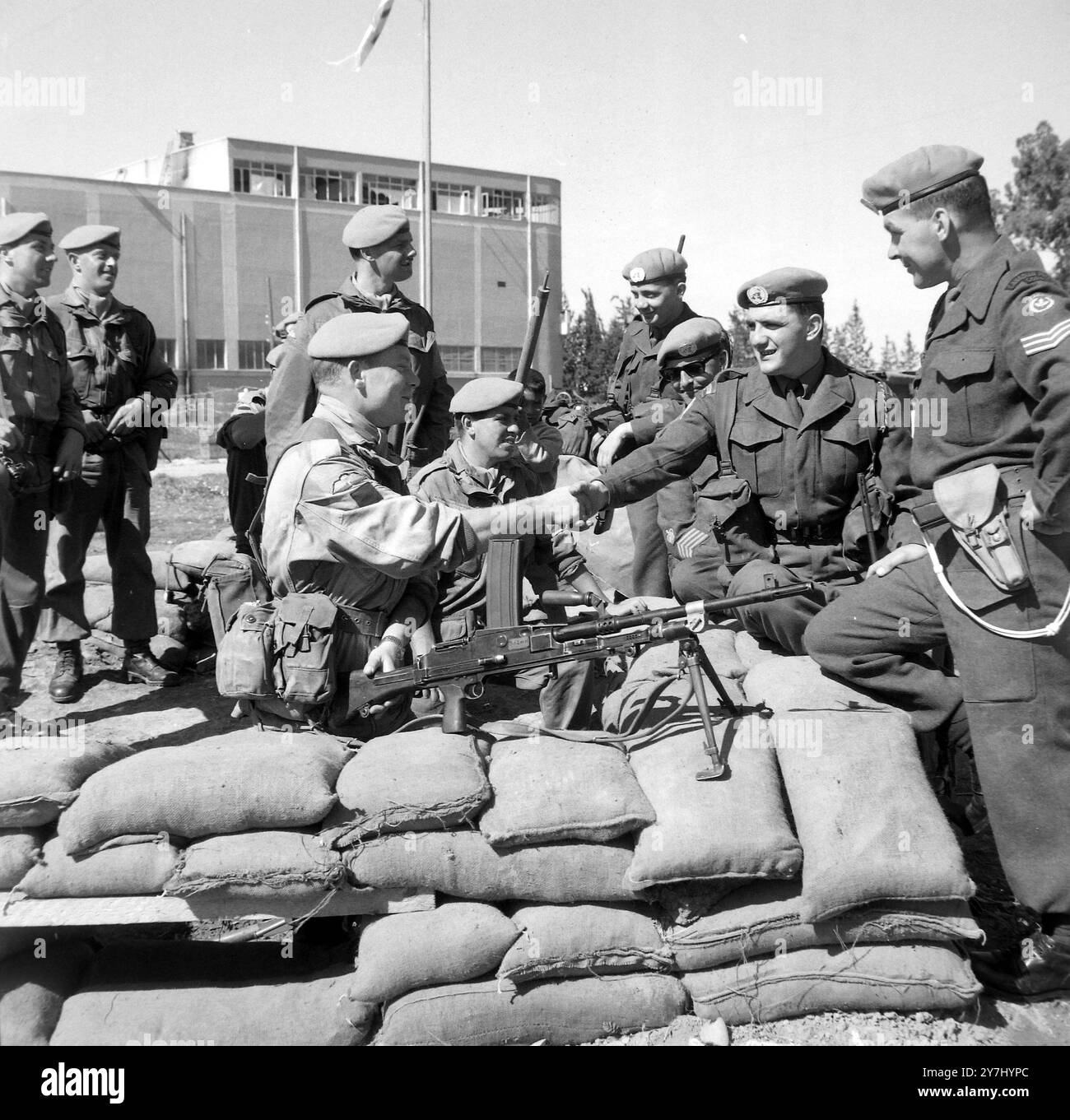 ARMY CANADIAN TROOPS SHAKE HANDS WITH BRITISH PARATROOPERS IN NICOSIA ...